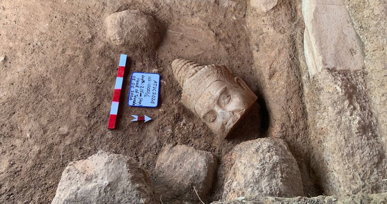 A Head of Deva Statue Discovered in an Excavation at Angkor Thom’s ...